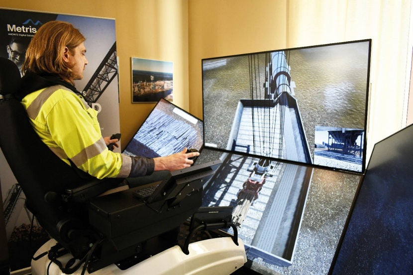 Weltweit erste autonome Rundholzkrane